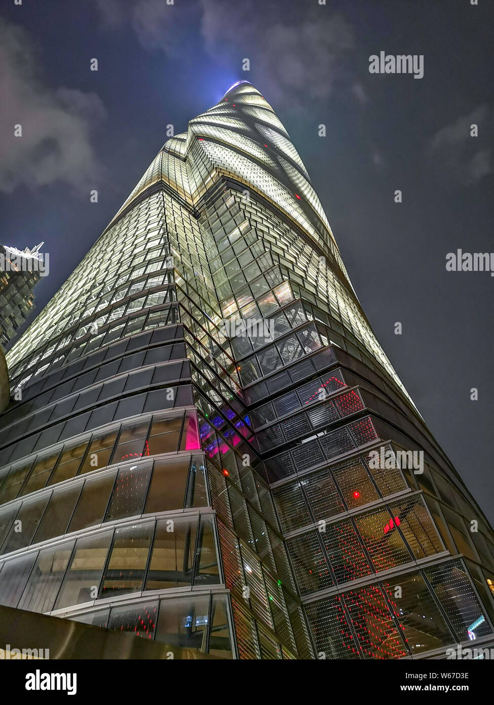 A view of Shanghai Tower from the ground at the Lujiazui Financial ...