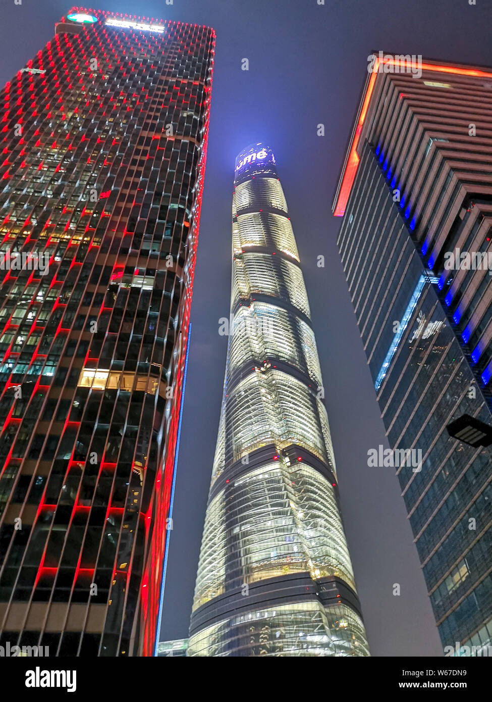 A view of Shanghai Tower from the ground at the Lujiazui Financial ...