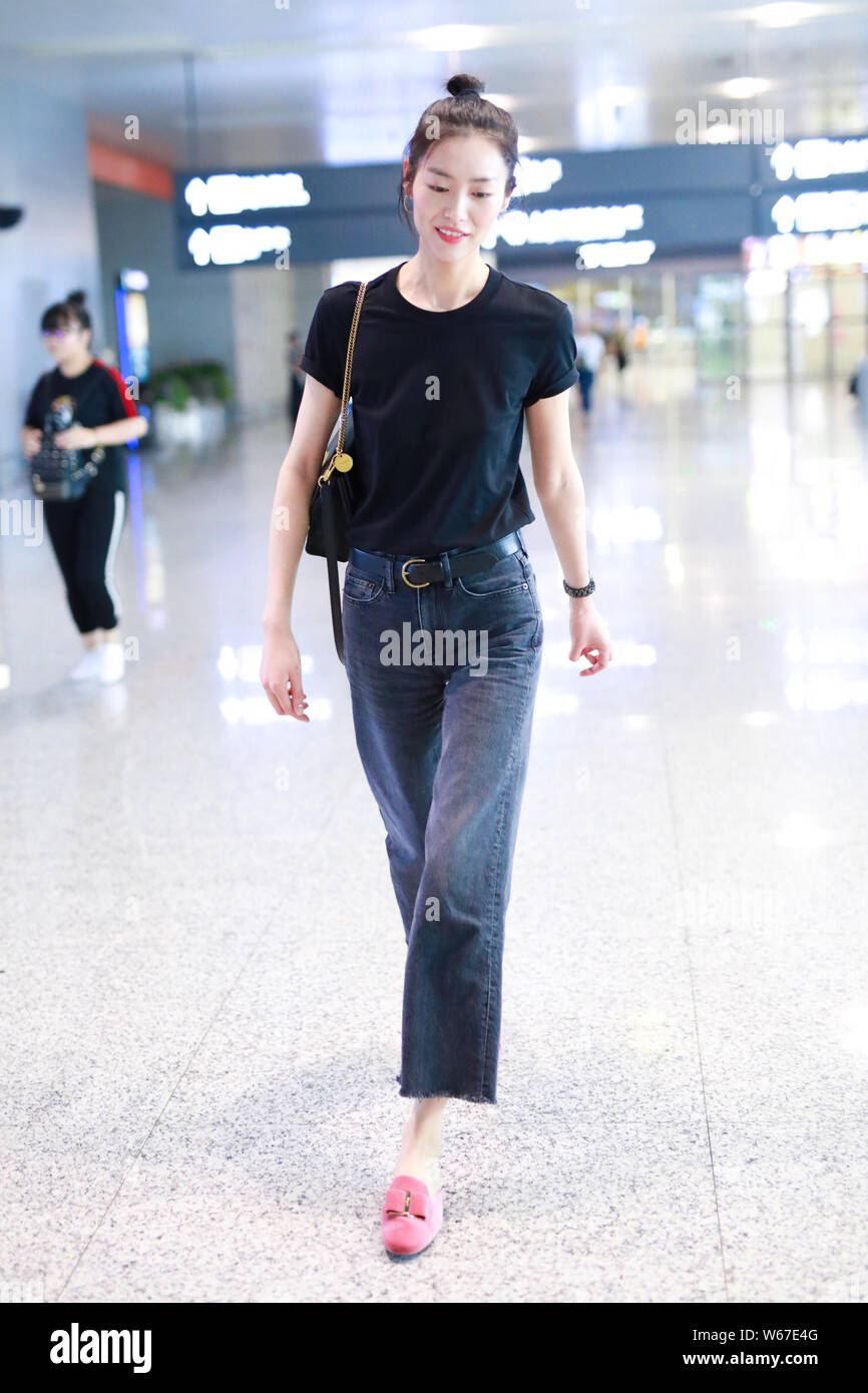 Chinese model Liu Wen arrives at the Shanghai Hongqiao International ...