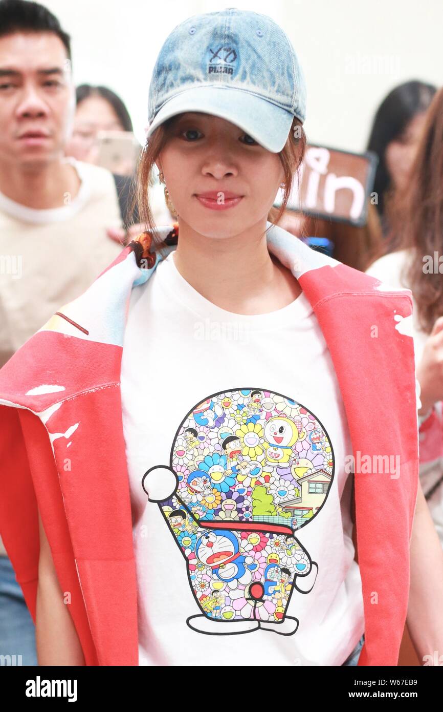 Taiwanese singer Jolin Tsai dressed in a Uniqlo Doraemon X Takashi ...
