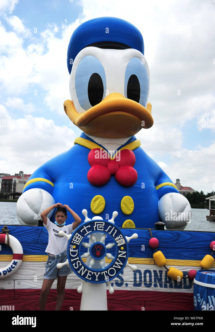 An 11-meter-tall inflatable Donald Duck is on display at the lakeside ...