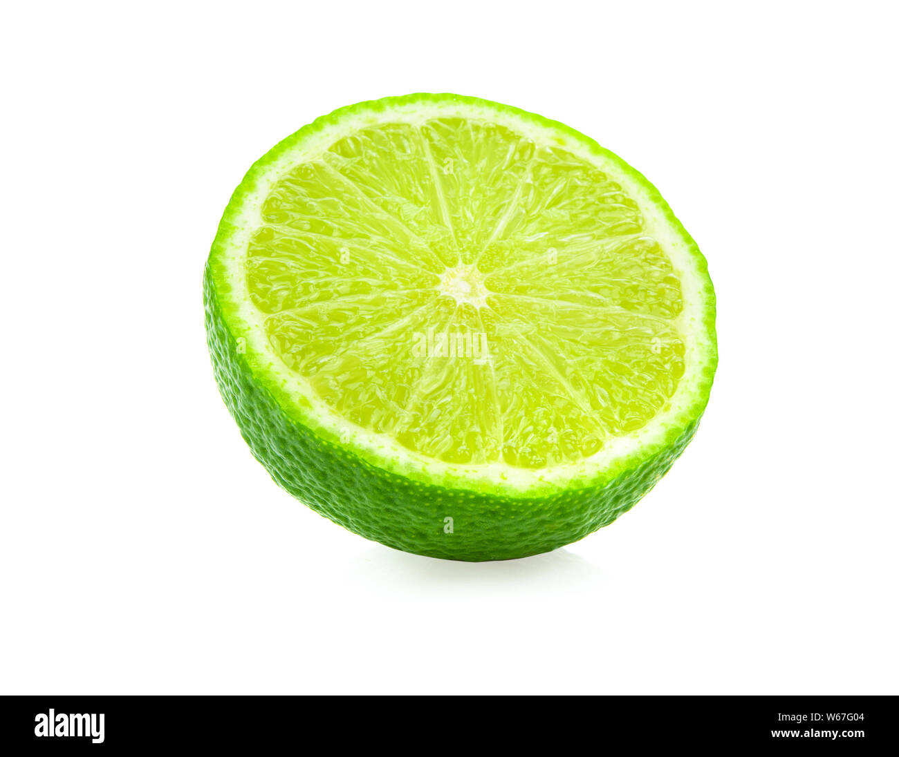 Lime cut isolated on white background Stock Photo - Alamy