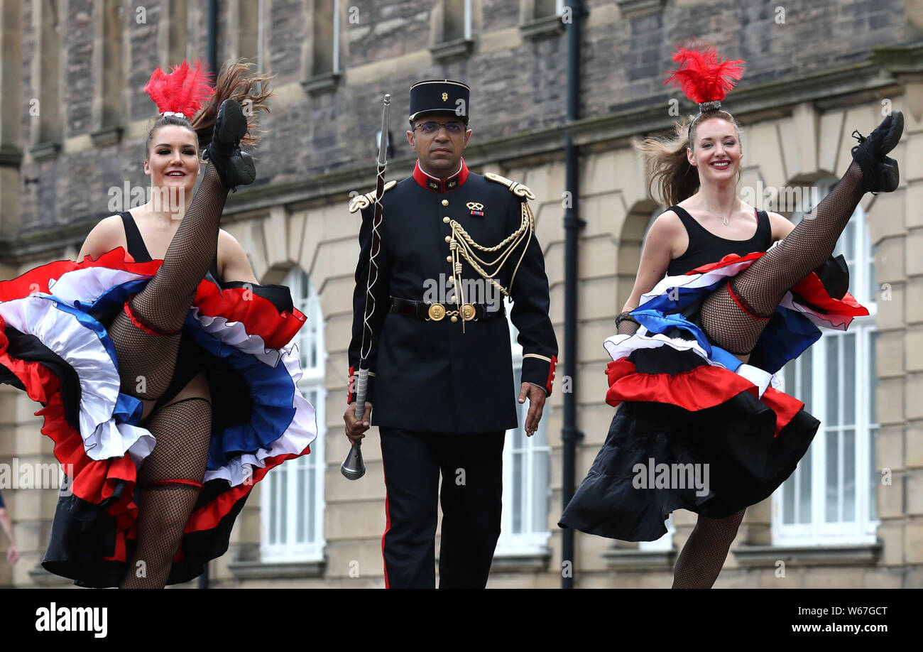 Adjutant chef Jean Michel Gatta from France is shown the Can Can dance ...