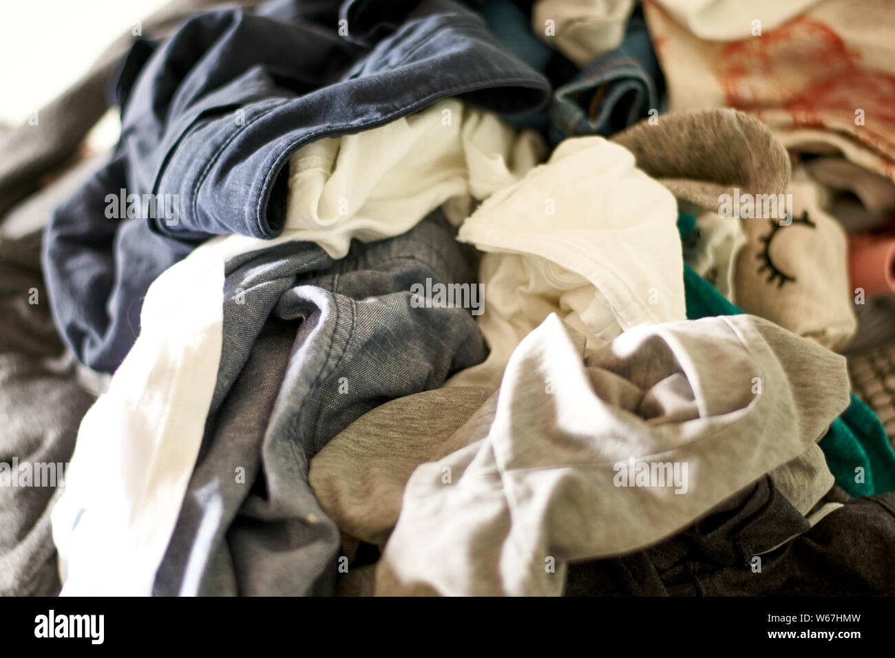 Unfolded clothes hi-res stock photography and images - Alamy