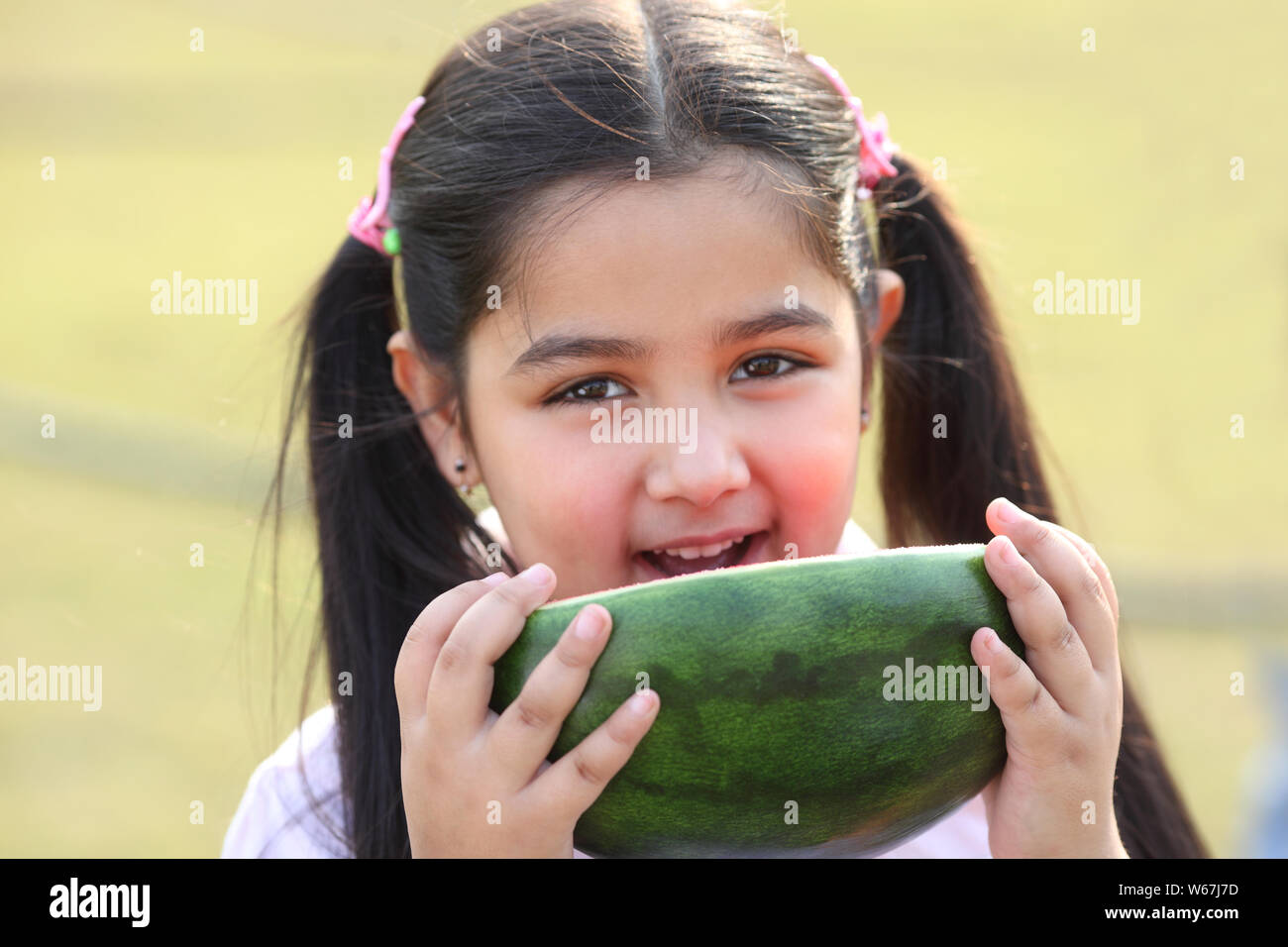Black girl eating watermelon fruit hi-res stock photography and images ...