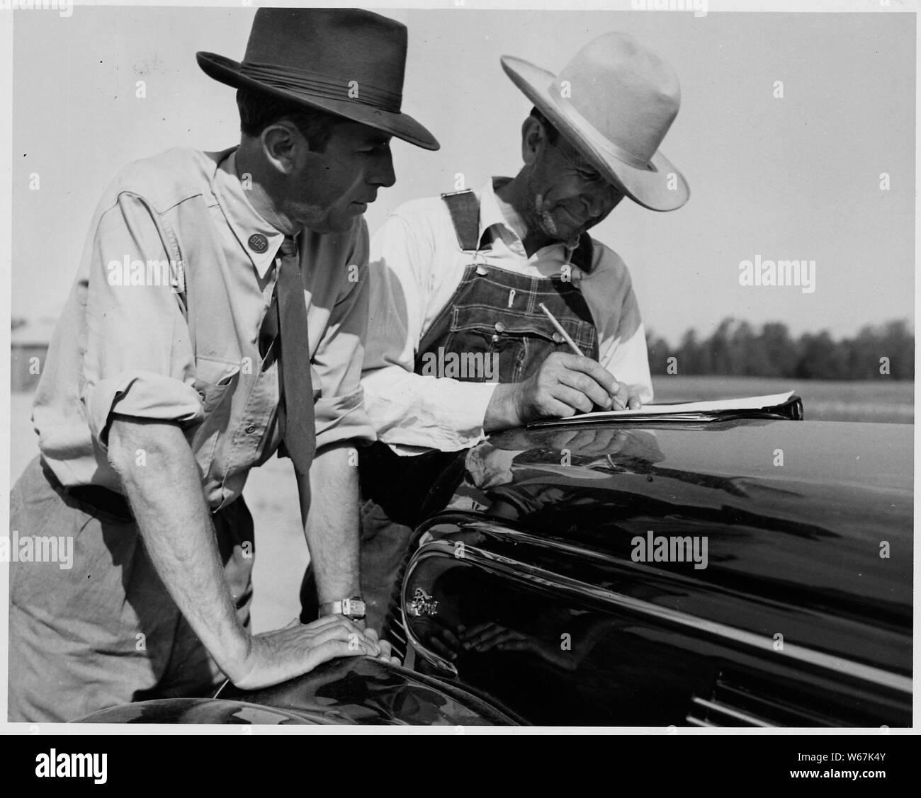 Newberry County, South Carolina. Mr. C. C. Spoon signing receipt for ...