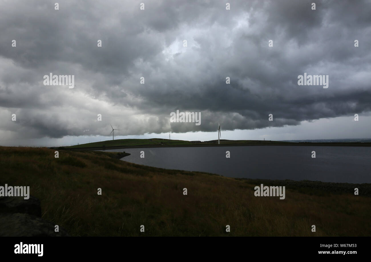 Greater Manchester, Edenfield. 31st July 2019. UK Weather: Storm clouds ...