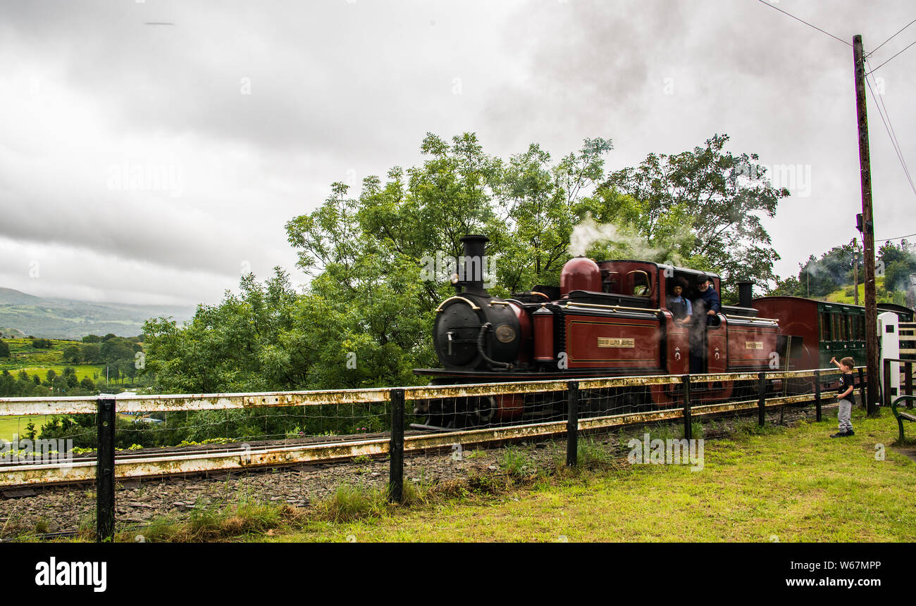 A little boy waves at a steam train driver Stock Photo - Alamy
