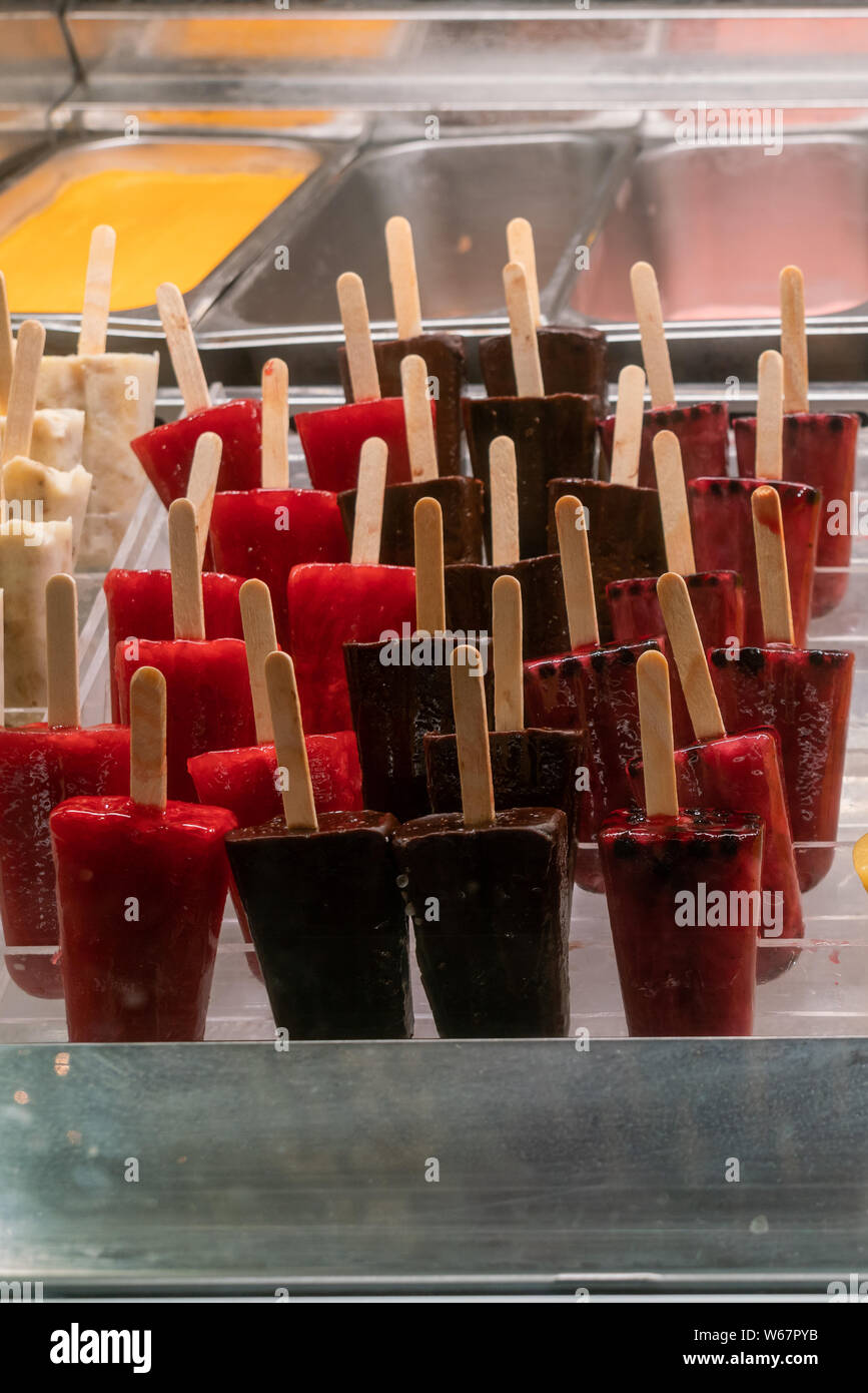 Yummy strawberry and cherry flavor ice pops in freezer Stock Photo - Alamy