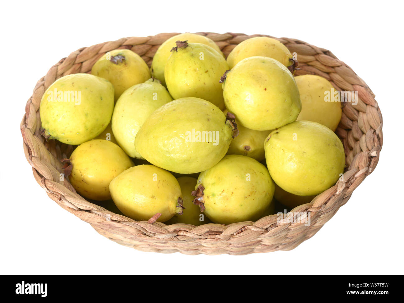 lot of guava in basket isolated on white Stock Photo - Alamy