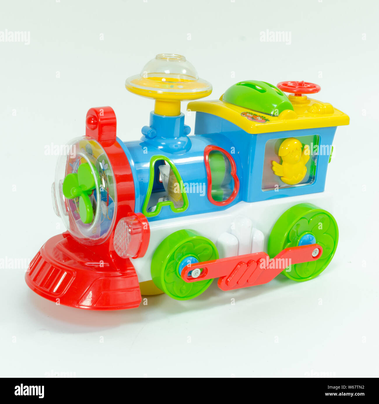 Plastic toy train isolated on white background. Children's toy plastic ...