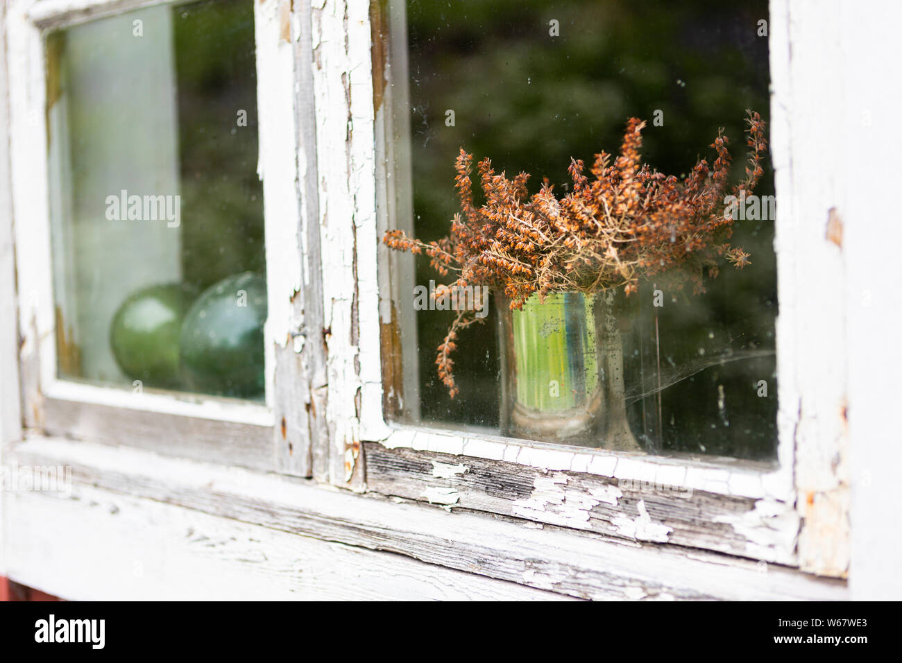 Old peeling wooden window with decoration Stock Photo - Alamy
