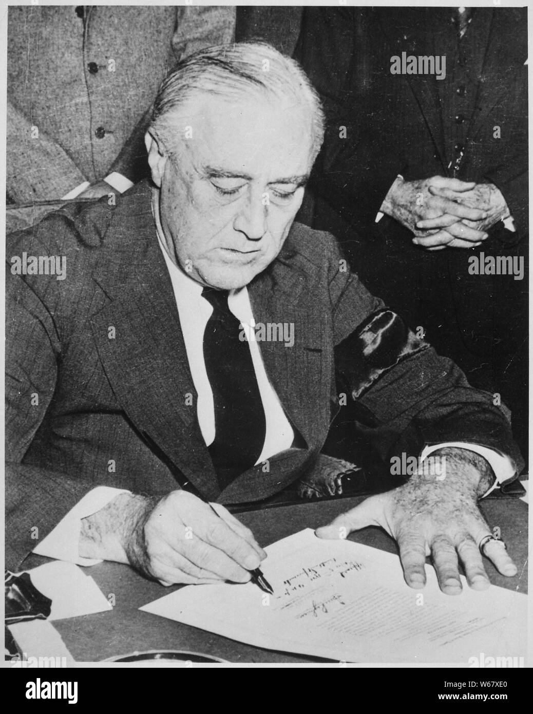 President franklin roosevelt signing hi-res stock photography and ...