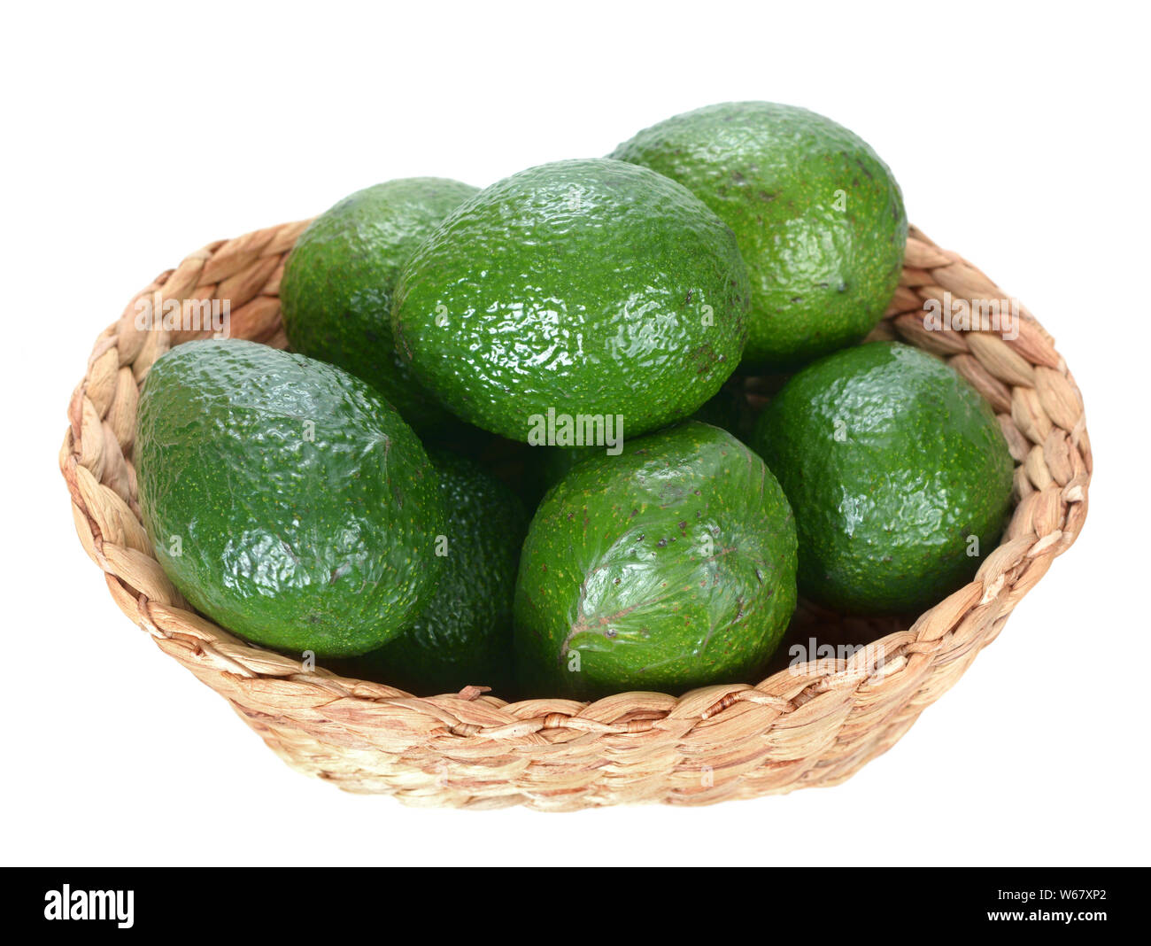 fresh green avocado in bamboo basket isolate on white background Stock ...