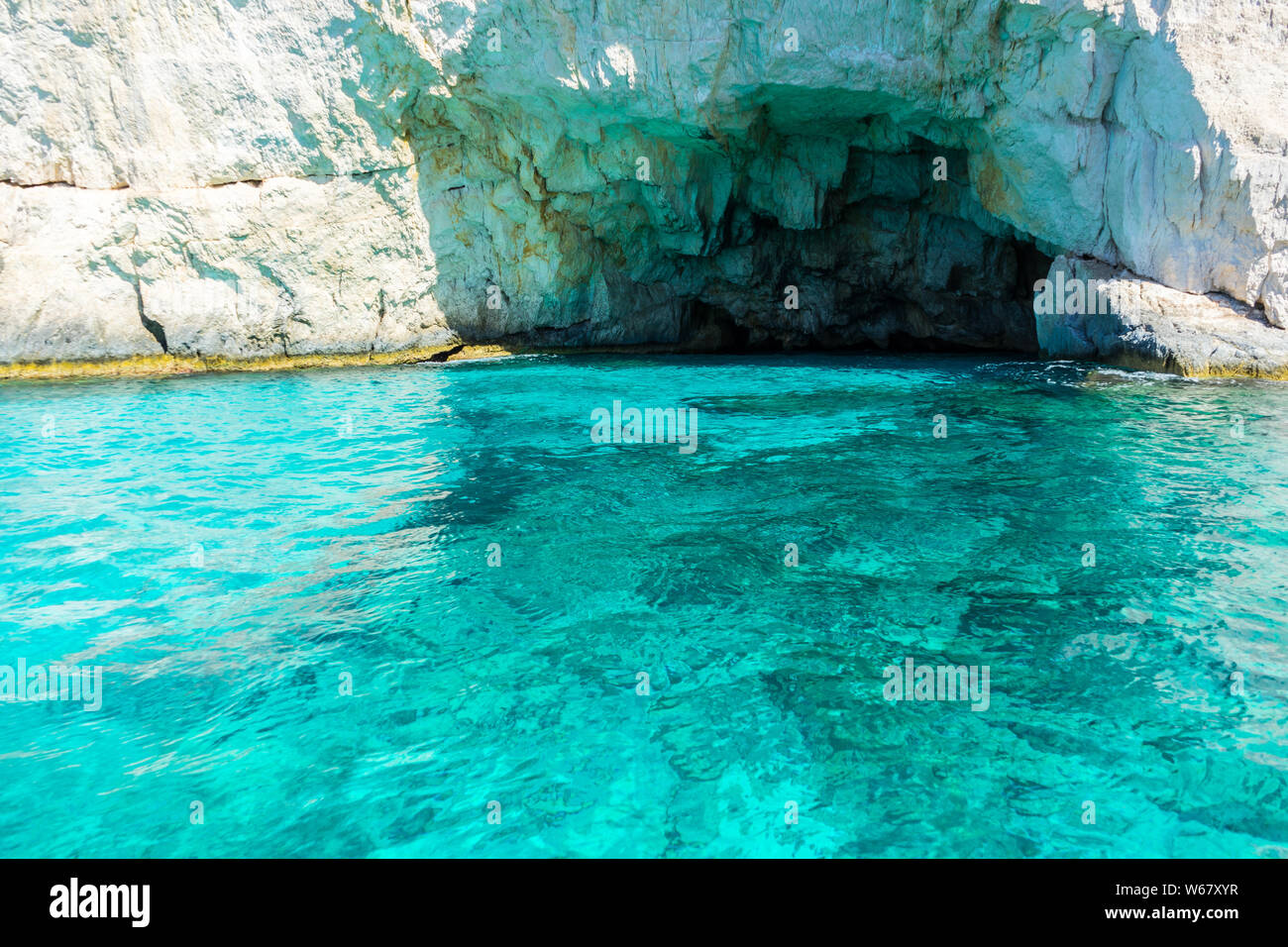 Greece, Zakynthos, Amazing shiny blue caves from azure waters Stock ...
