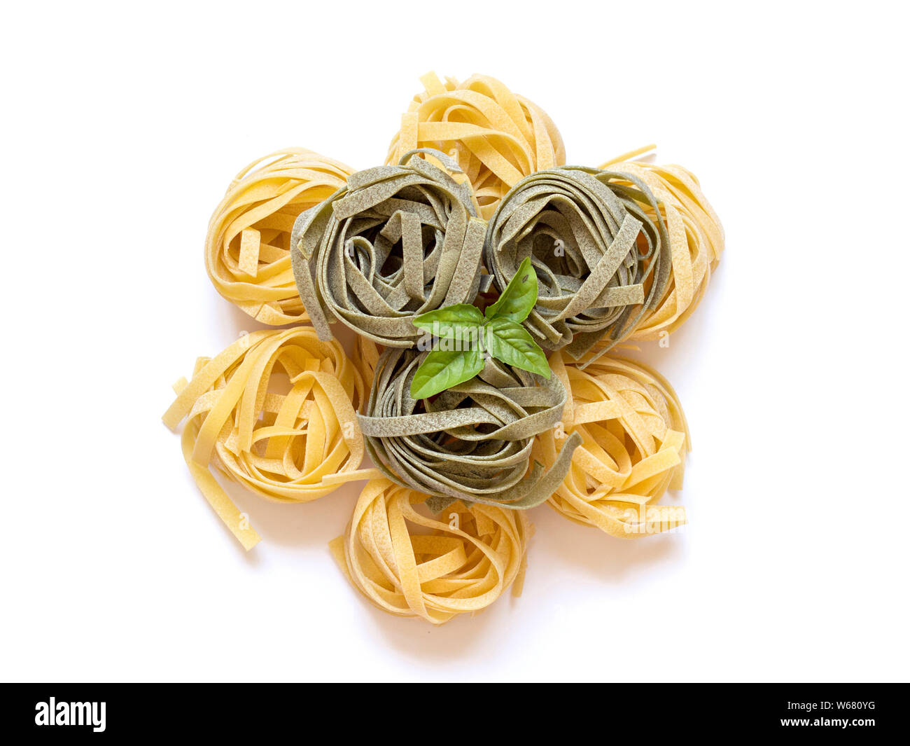Raw green pasta nest Cut Out Stock Images & Pictures - Alamy
