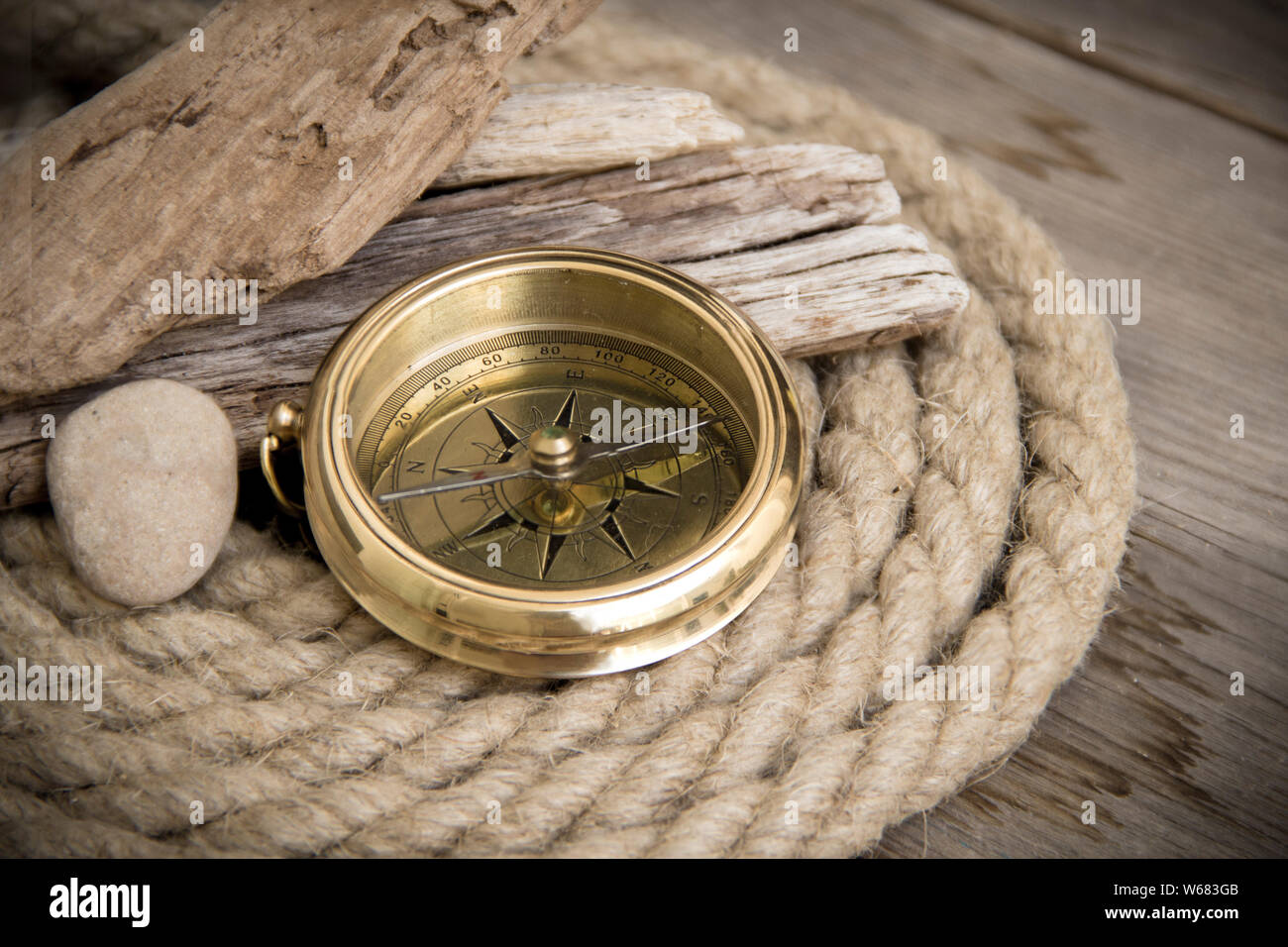 Exploring background with compass Stock Photo - Alamy