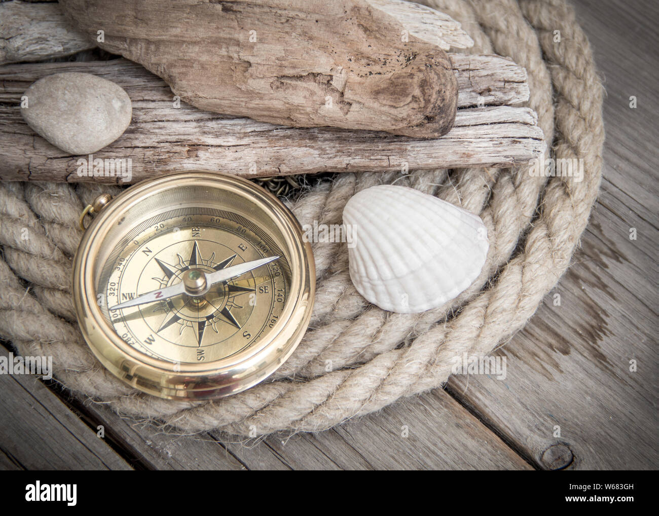 Exploring background with compass Stock Photo - Alamy