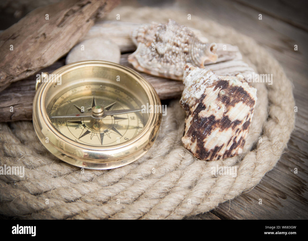 Exploring background with compass Stock Photo - Alamy