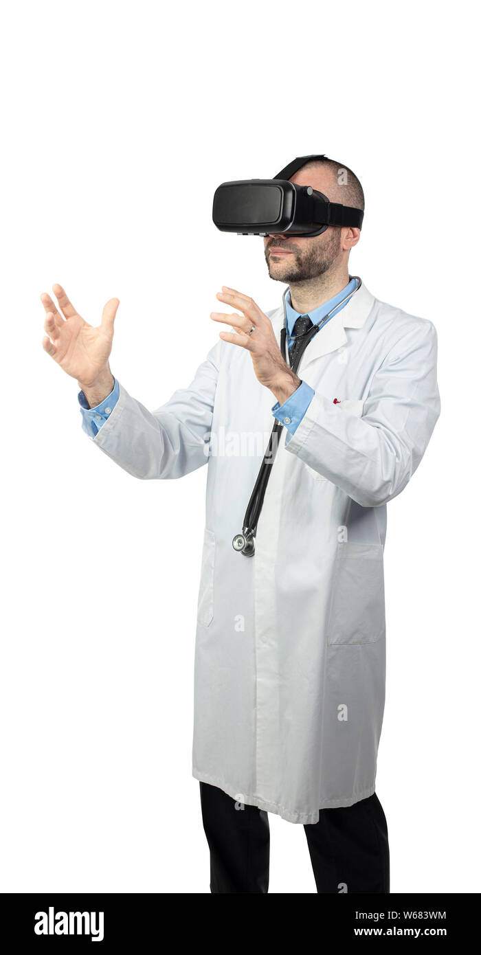 doctor uses virtual reality glasses to simulate an operation. isolated ...
