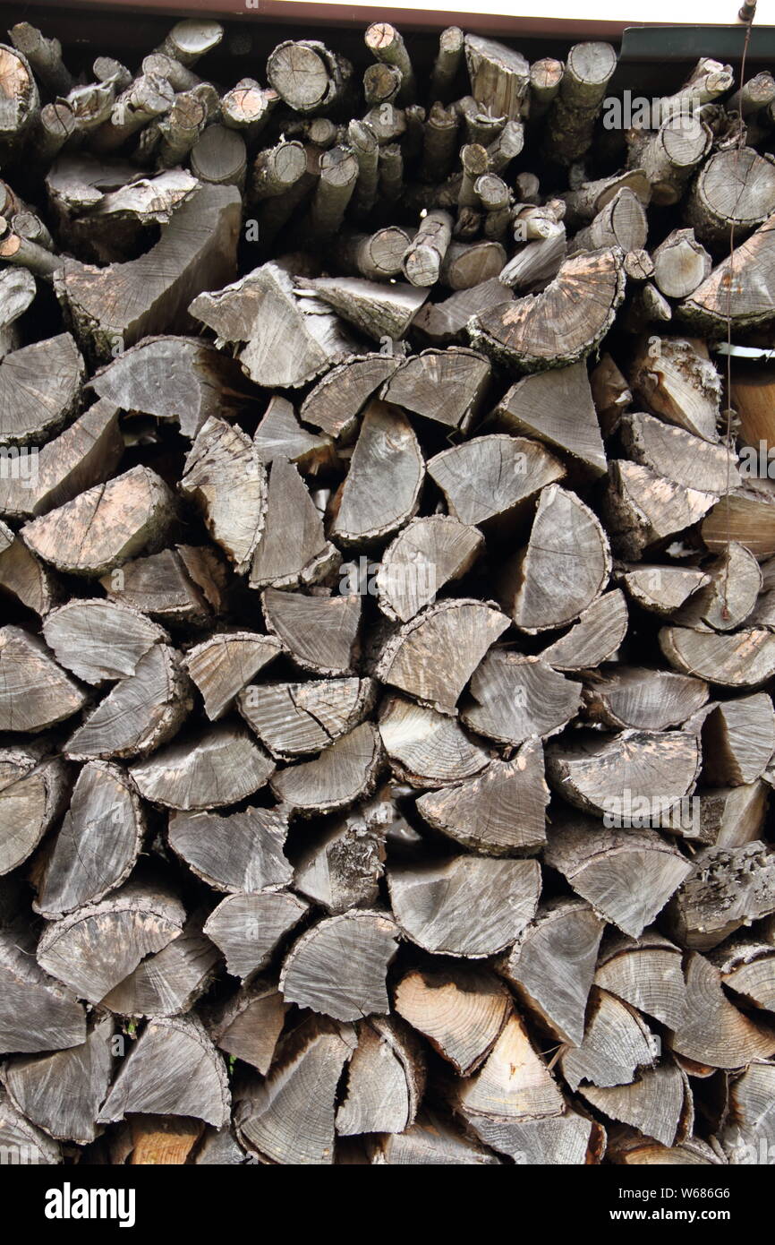 split dry firewood Stock Photo - Alamy