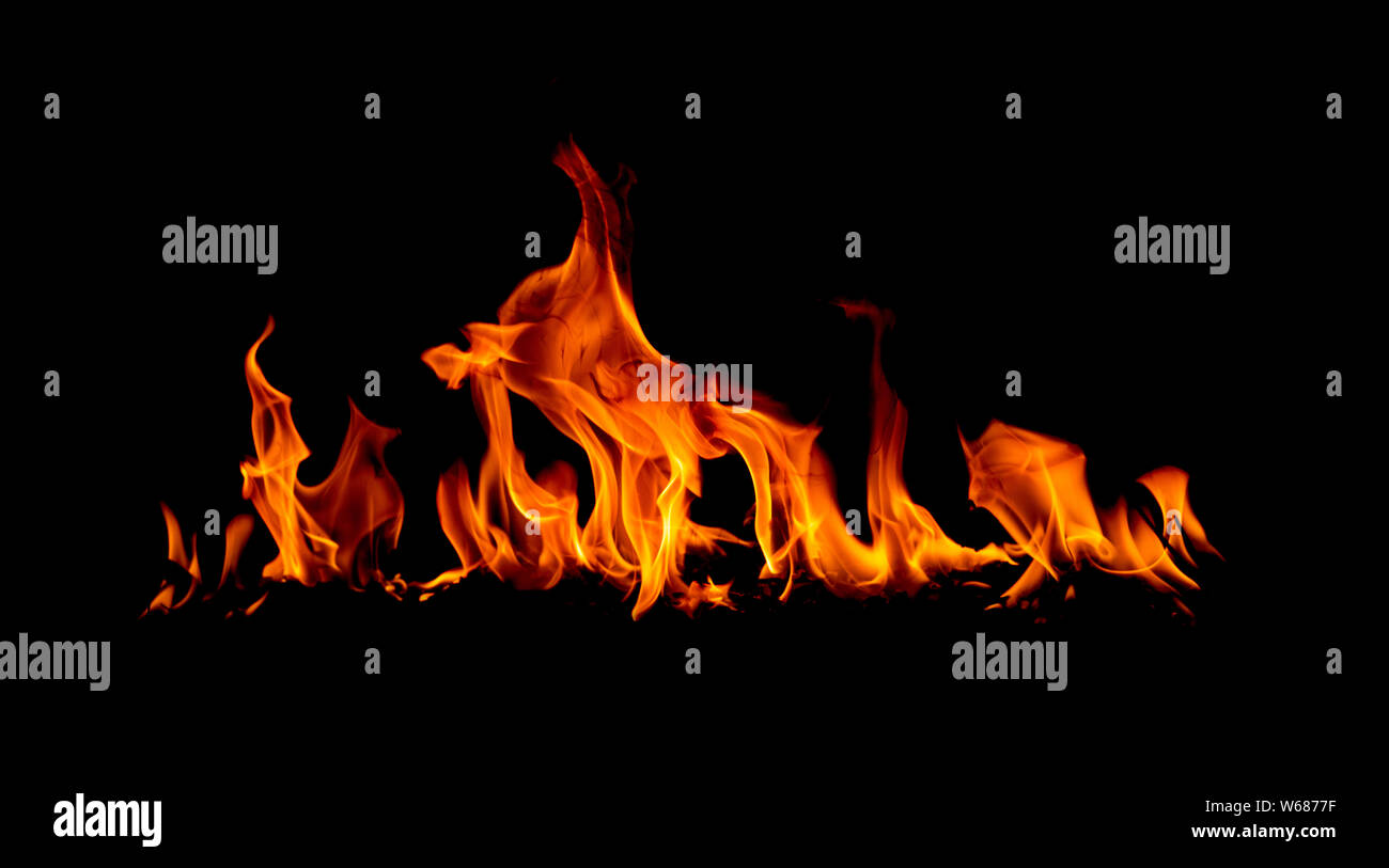 Fire flames on Abstract art black background, Burning red hot sparks ...