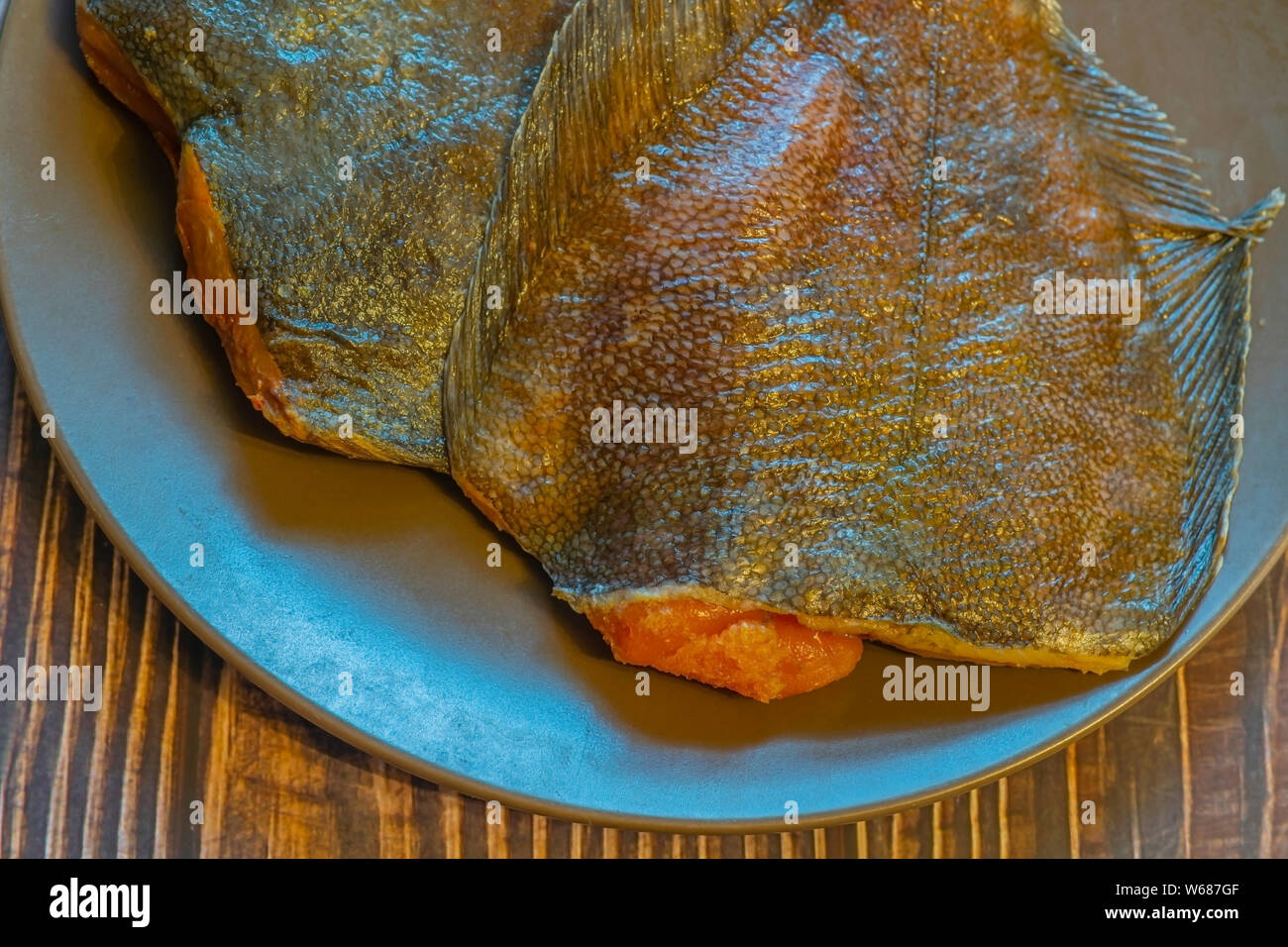 Fresh fish without the head with caviar. Cooked for frying Stock Photo ...