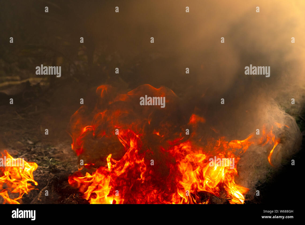Fire flames burning tire red hot sparks Stock Photo - Alamy