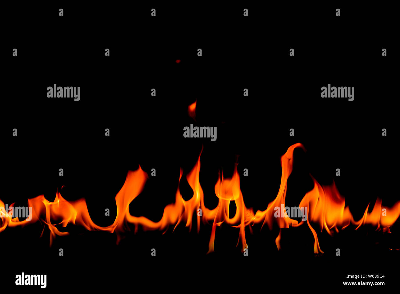 Fire flames on Abstract art black background, Burning red hot sparks ...