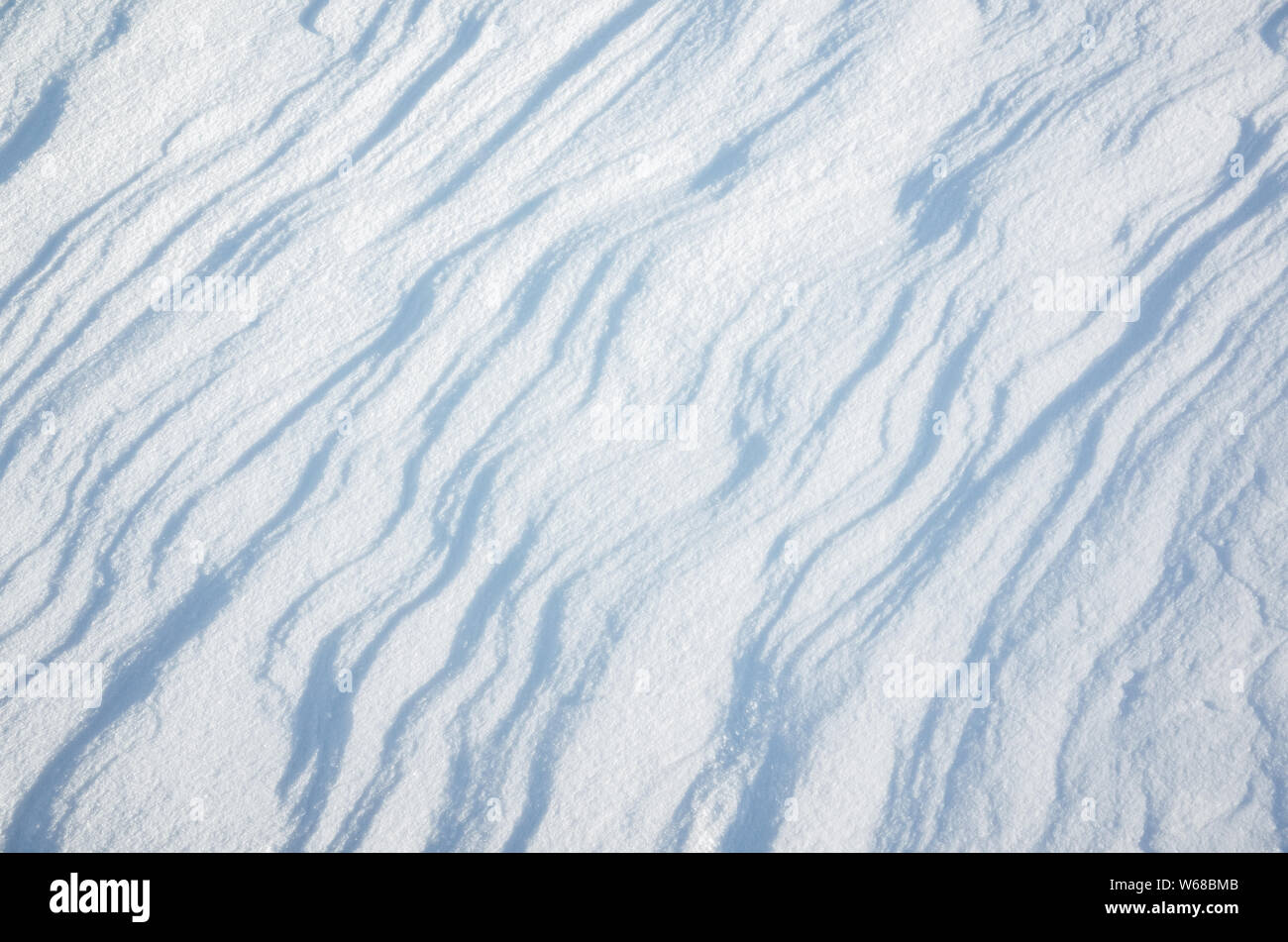 Abstract natural snow background texture; snowdrift relief with nice ...