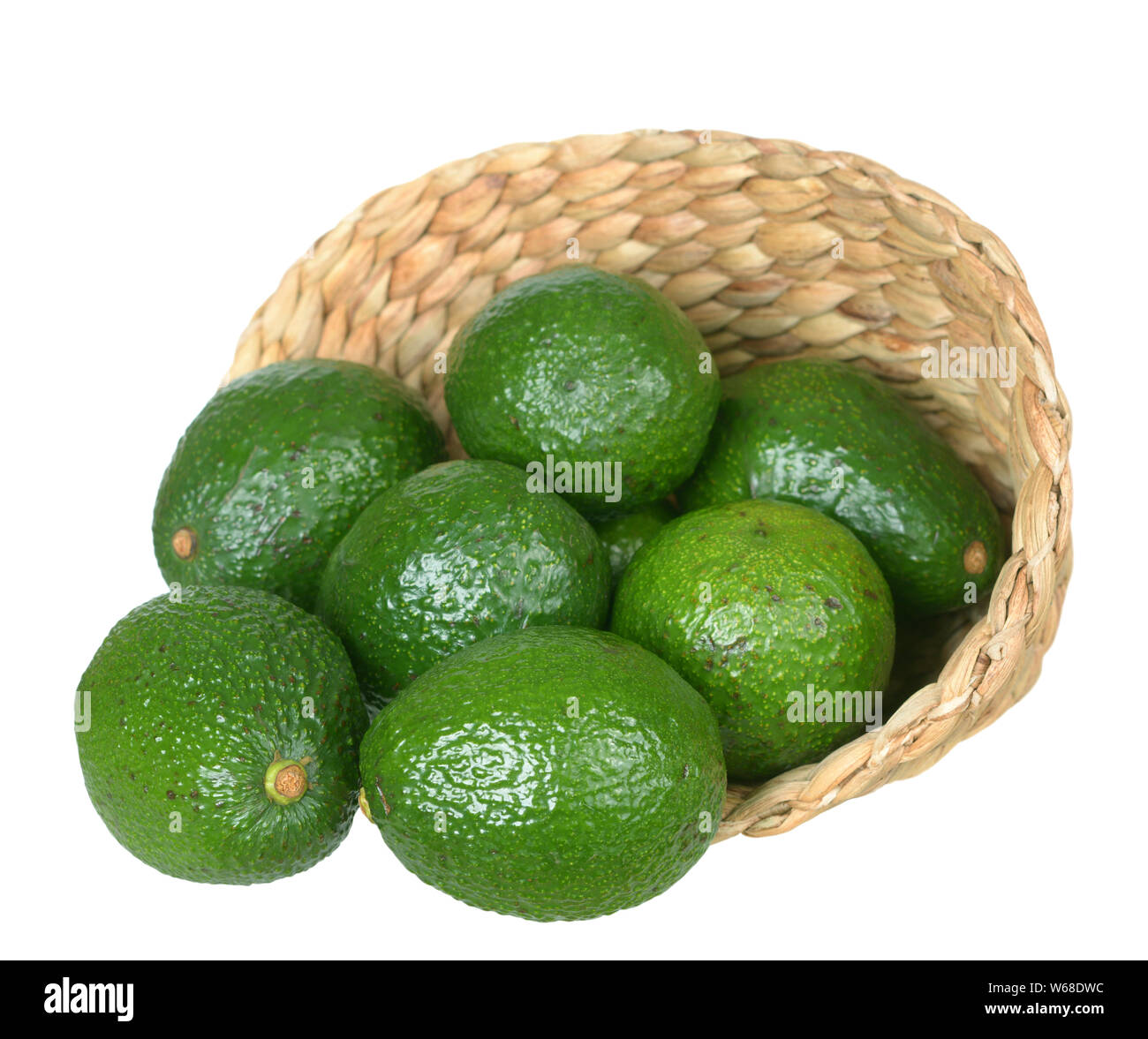 fresh green avocado in bamboo basket isolate on white background Stock ...