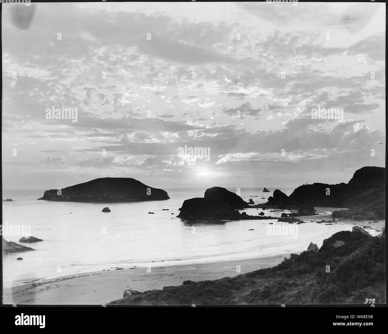 THE SUN SETS AT HARRIS BEACH Stock Photo - Alamy