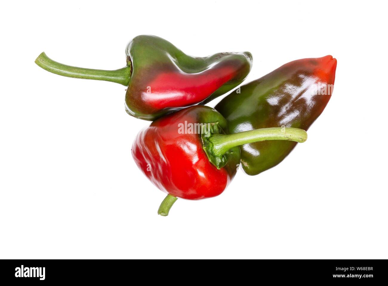 Group of fresh red and green pepper isolated on white background ...