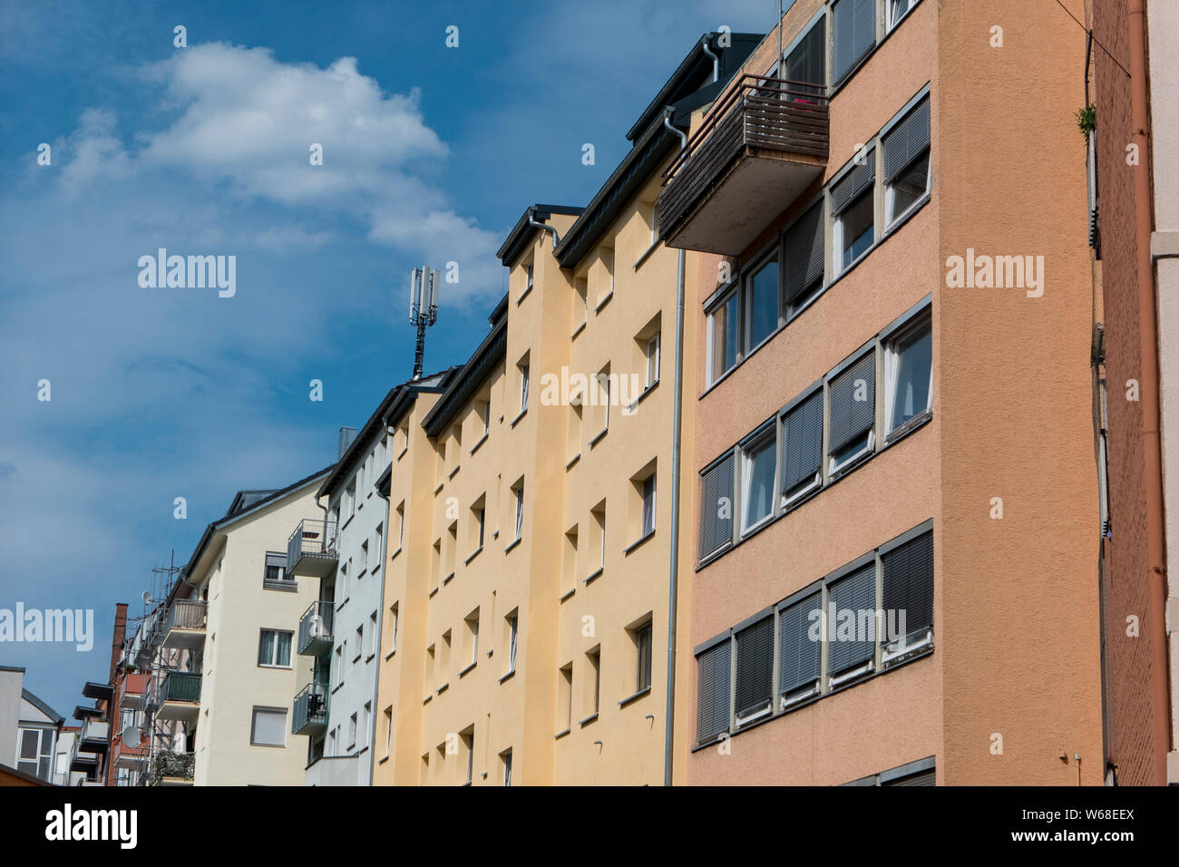 Apartment block social housing with colorful facades Stock Photo - Alamy