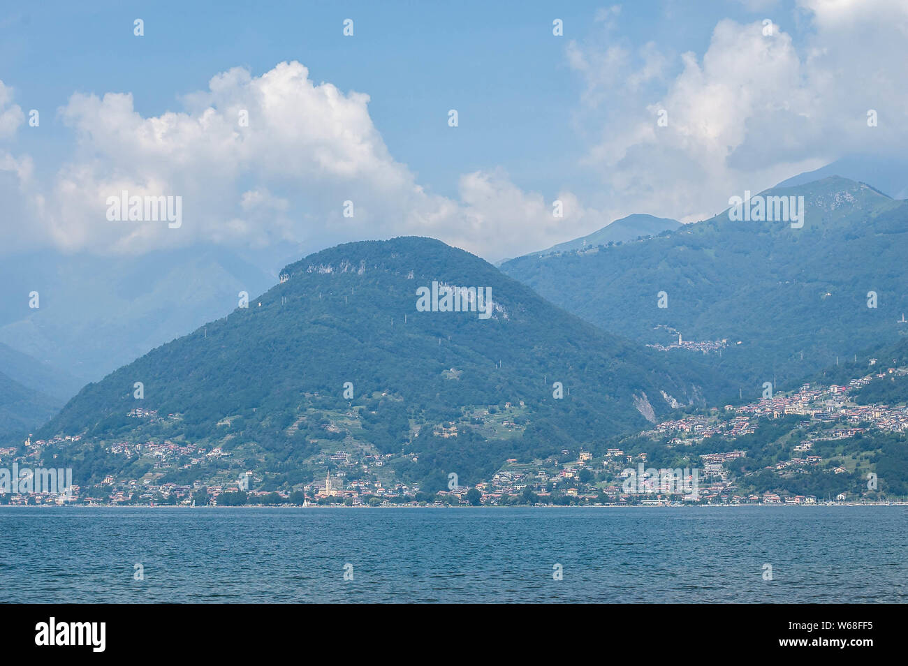 View of mountain lake on a sunny summer day. District of Como Lake ...