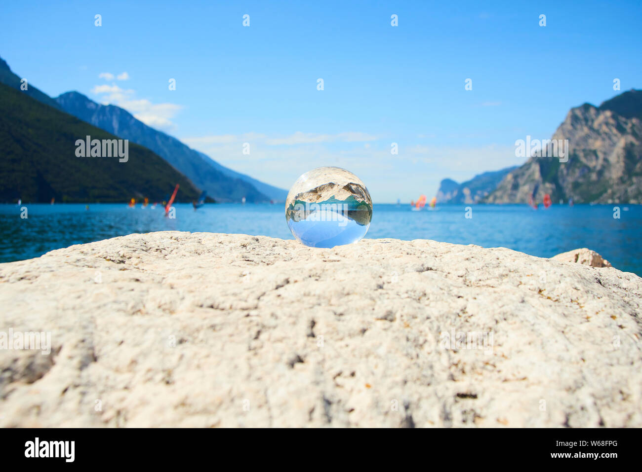 Lake Garda (Lago di Garda or Lago Benaco) seen through a glass crystal ...