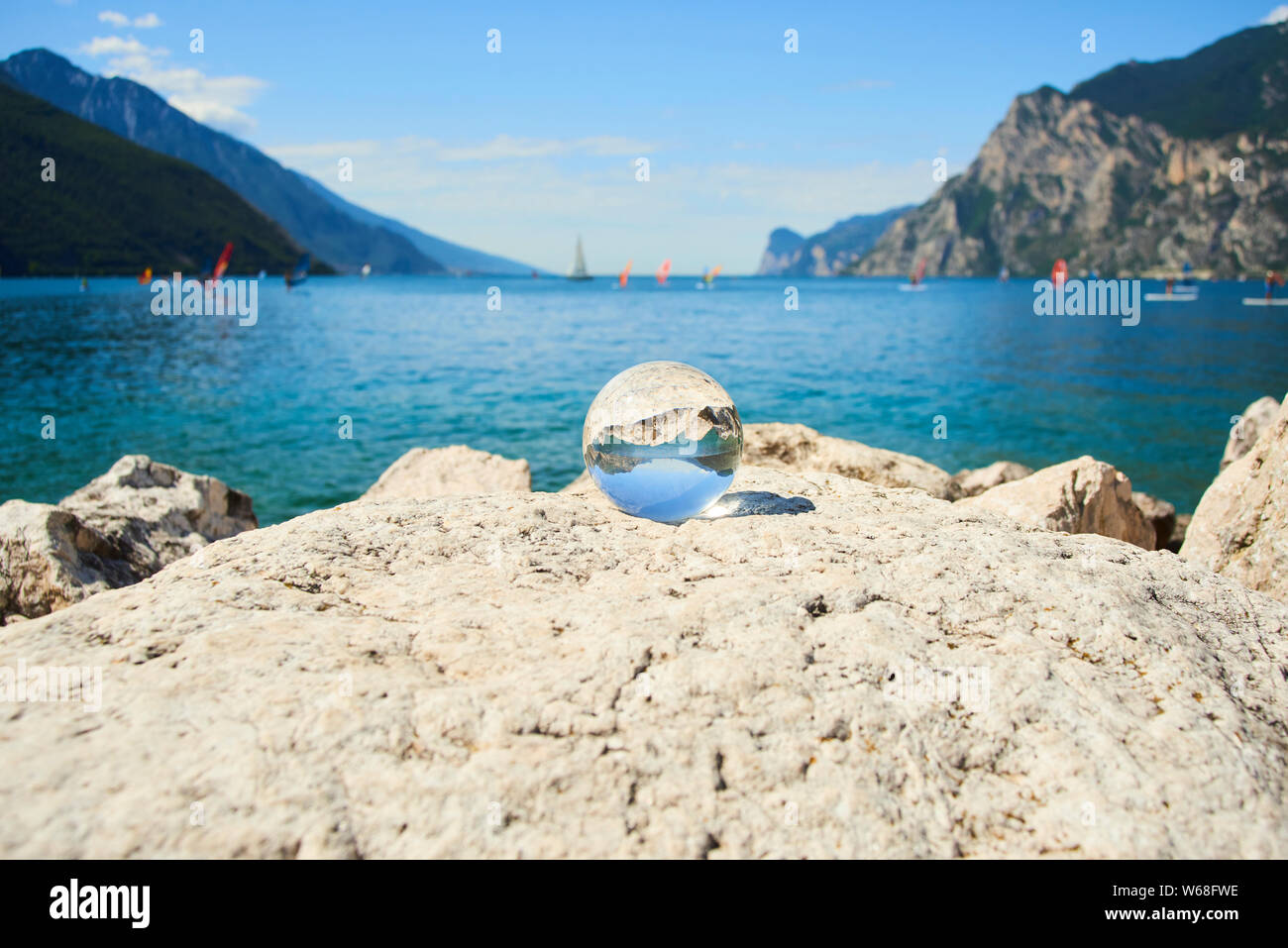 Lake Garda (Lago di Garda or Lago Benaco) seen through a glass crystal ...
