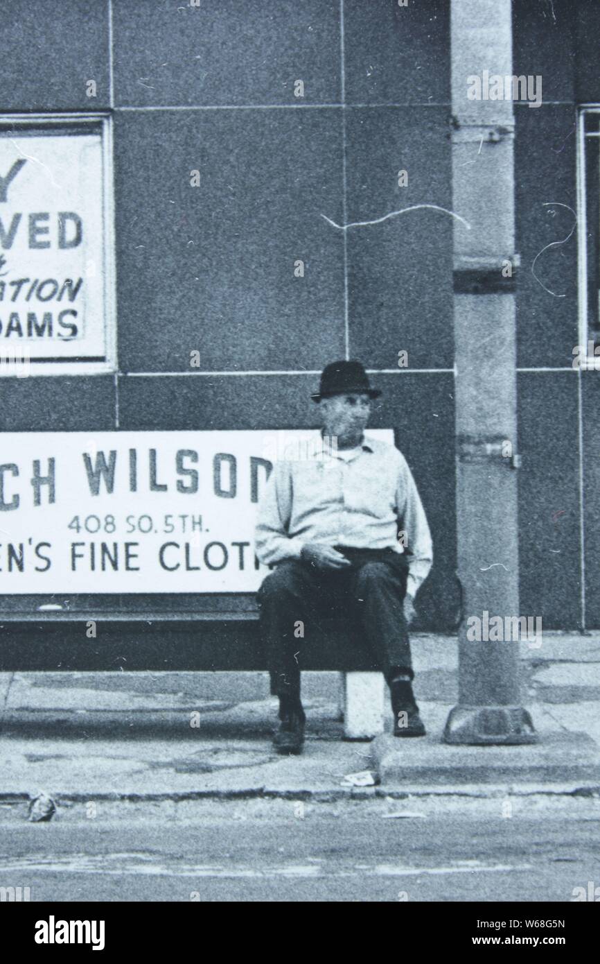 Fine black and white art photography from the 1970s of men sitting on a ...