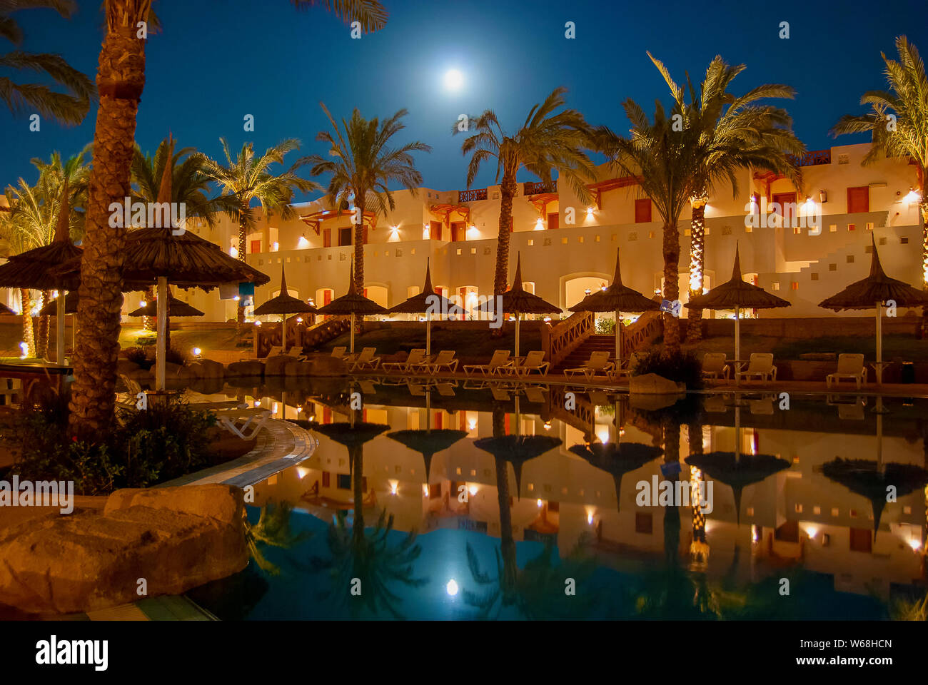 Full moon reflecting in a swimming pool Stock Photo - Alamy