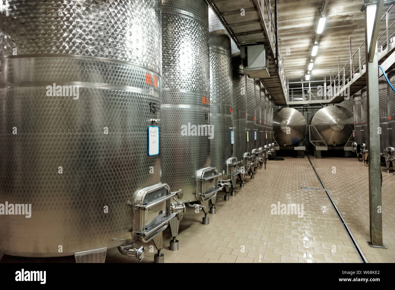 Large volume stainless steel fermenters used to make wine Stock Photo ...