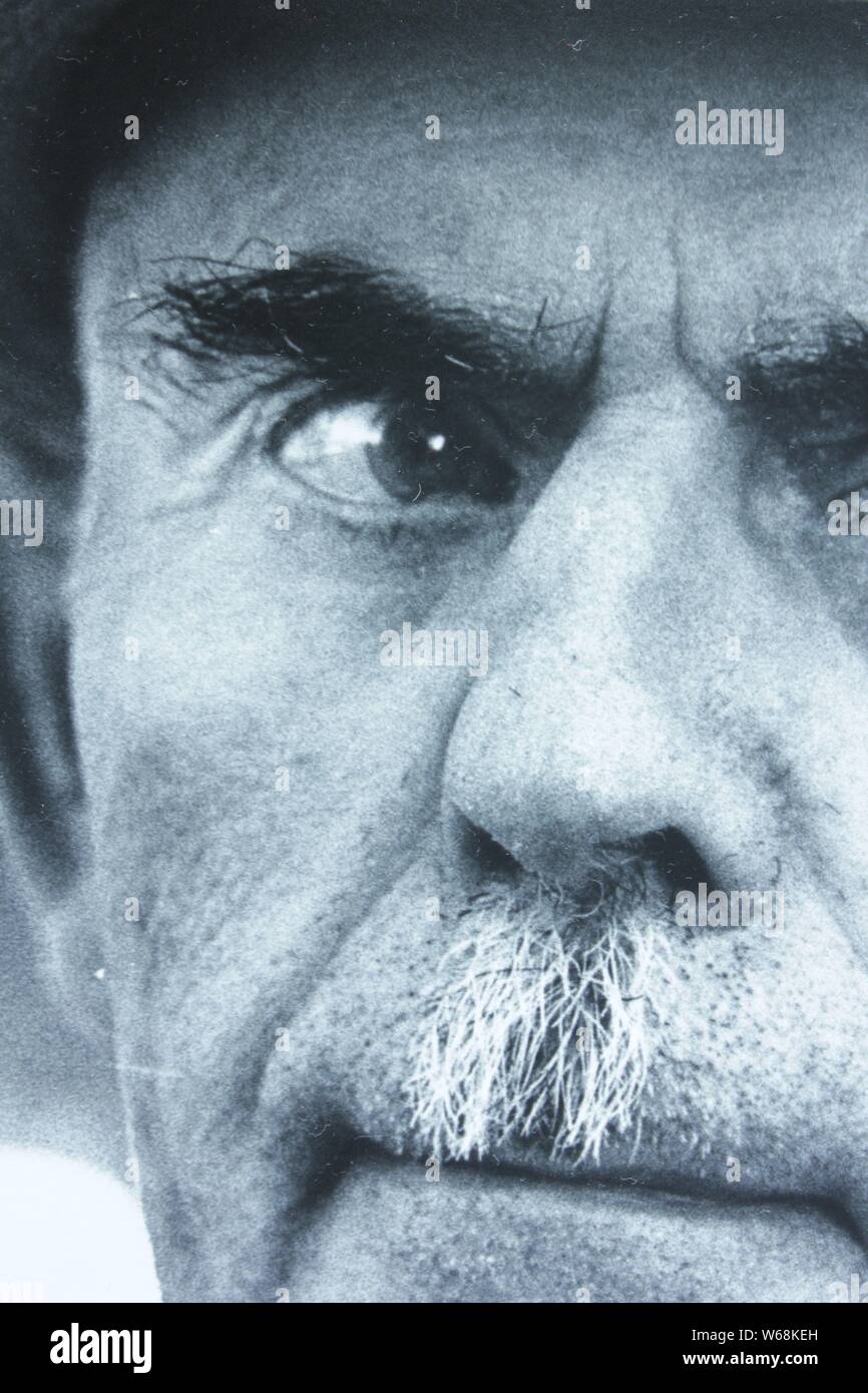 Fine black and white art photography portrait of a cautious man from ...