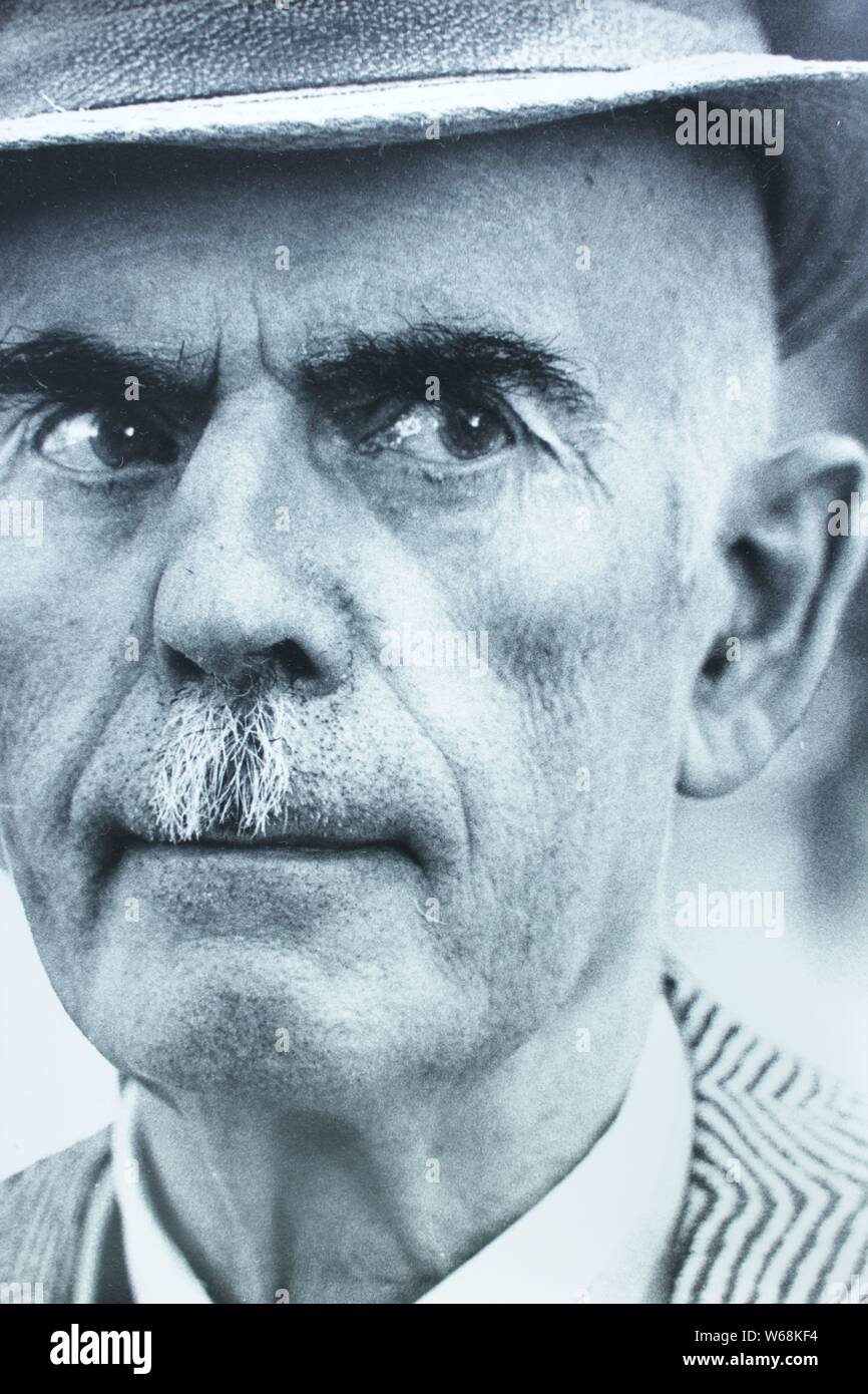 Fine black and white art photography portrait of a cautious man from ...