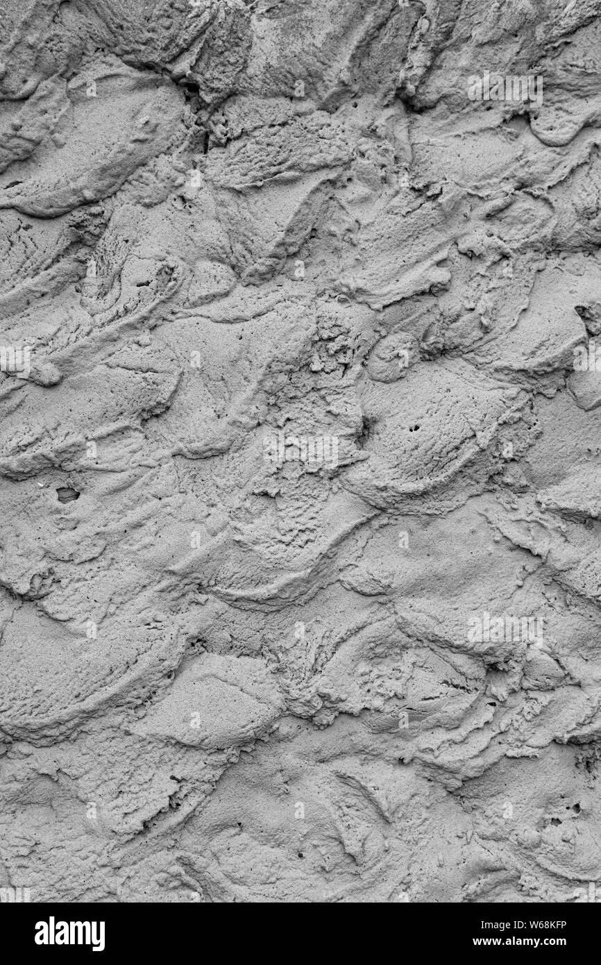 Rough cement plaster on the wall. Facade plaster background. Single-ply ...