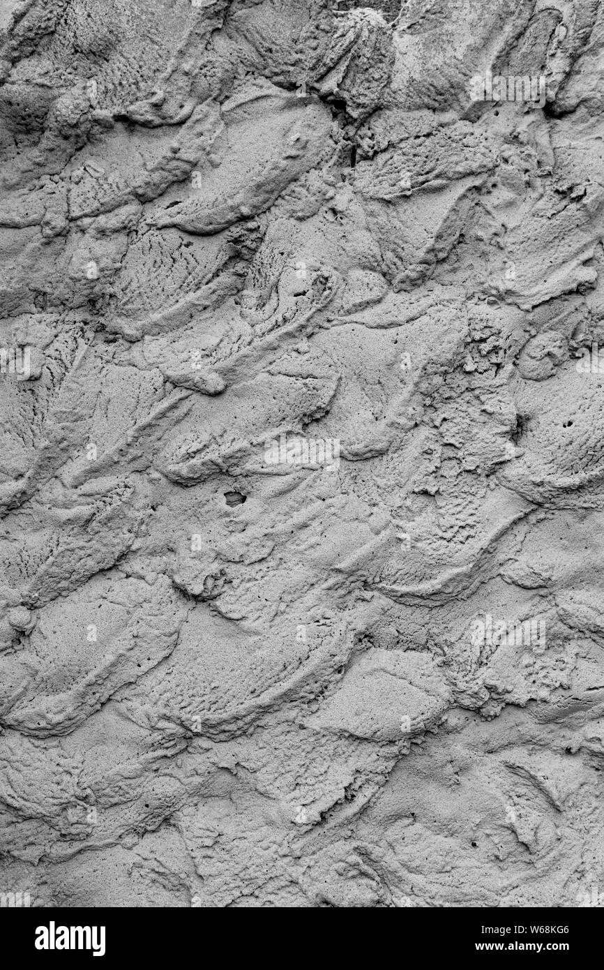 Rough cement plaster on the wall. Facade plaster background. Single-ply ...