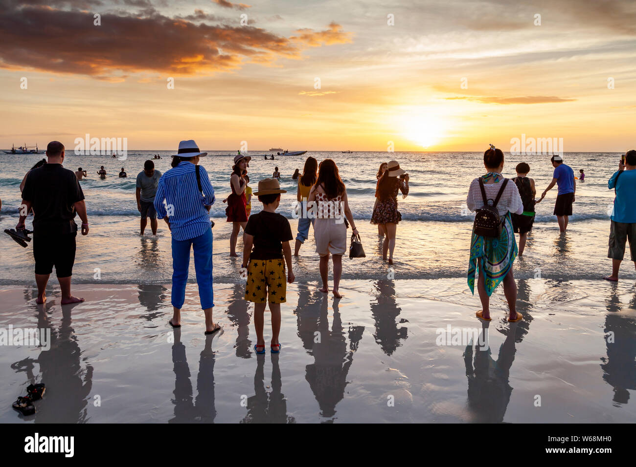Tourists Gather To Watch The Sunset On White Beach, Boracay, Aklan ...