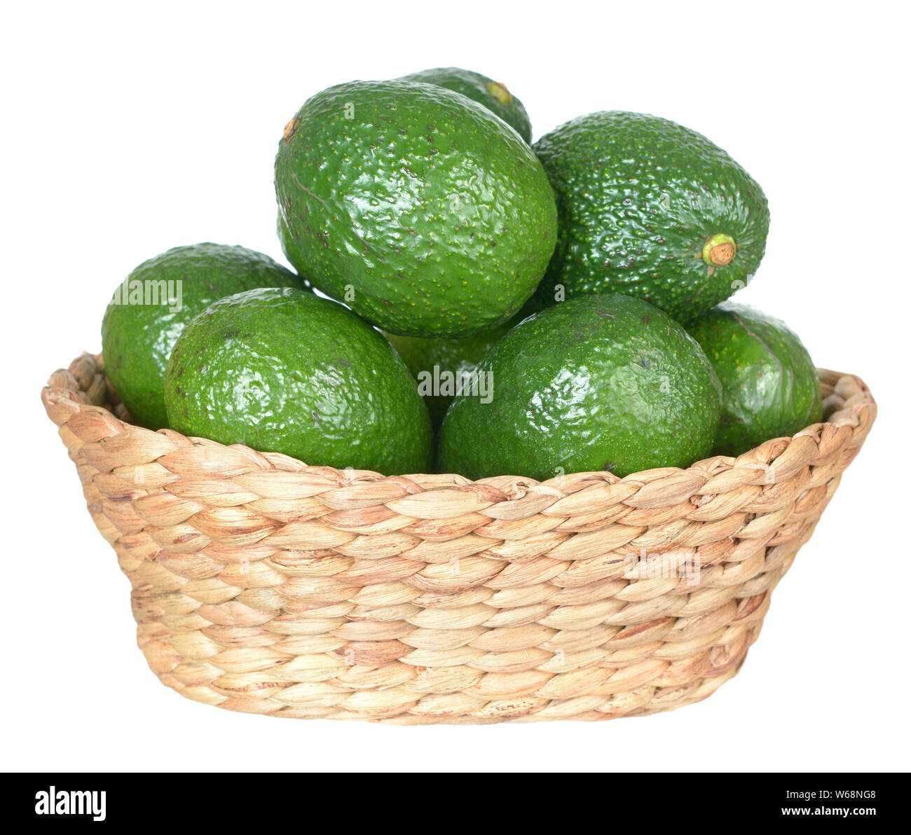 fresh green avocado in bamboo basket isolate on white background Stock ...