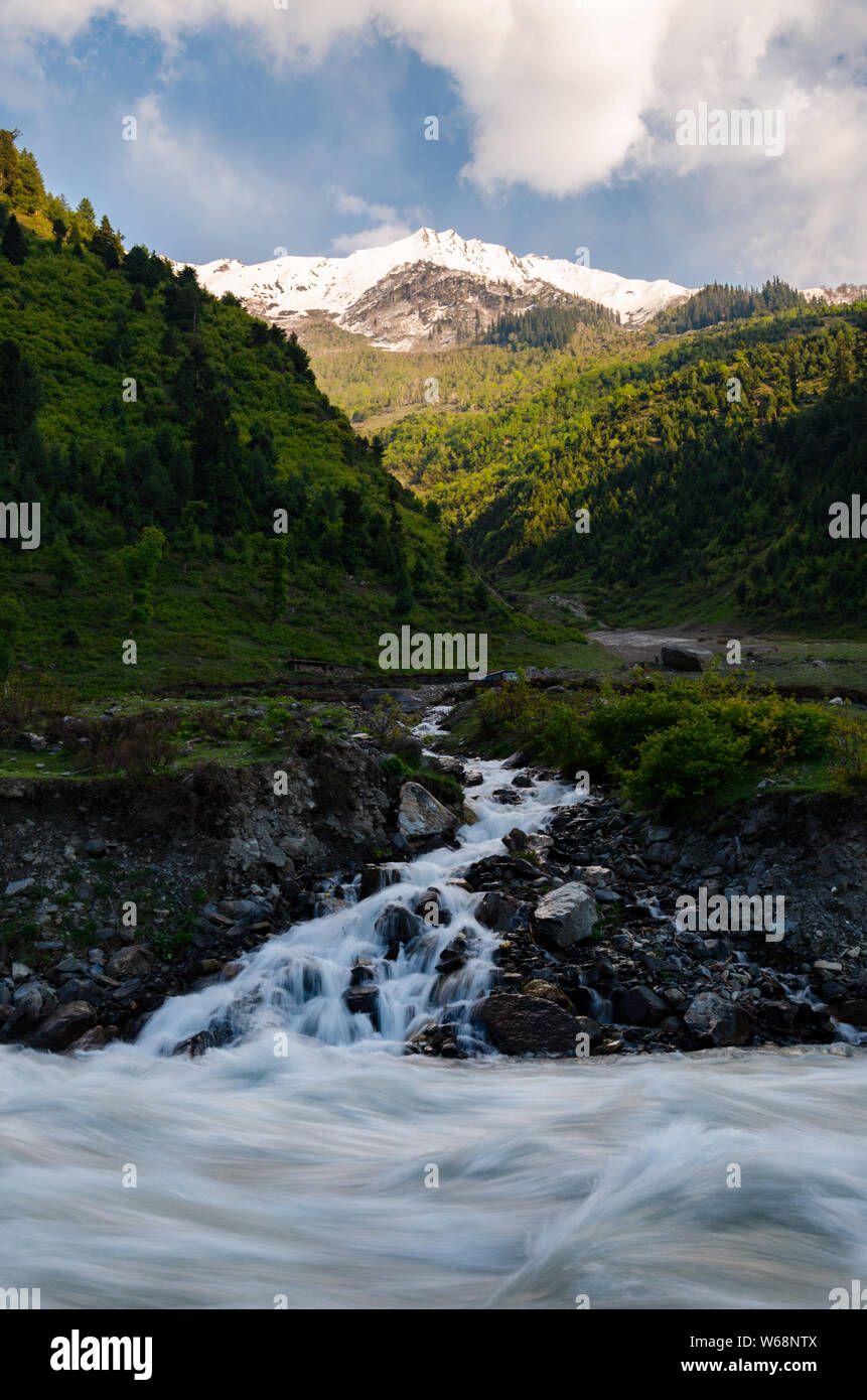 Beautiful, scenic view of river formed from melting snow flowing into ...