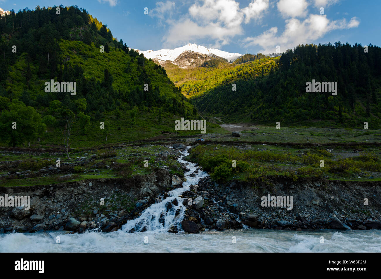 Beautiful, scenic view of river formed from melting snow flowing into ...