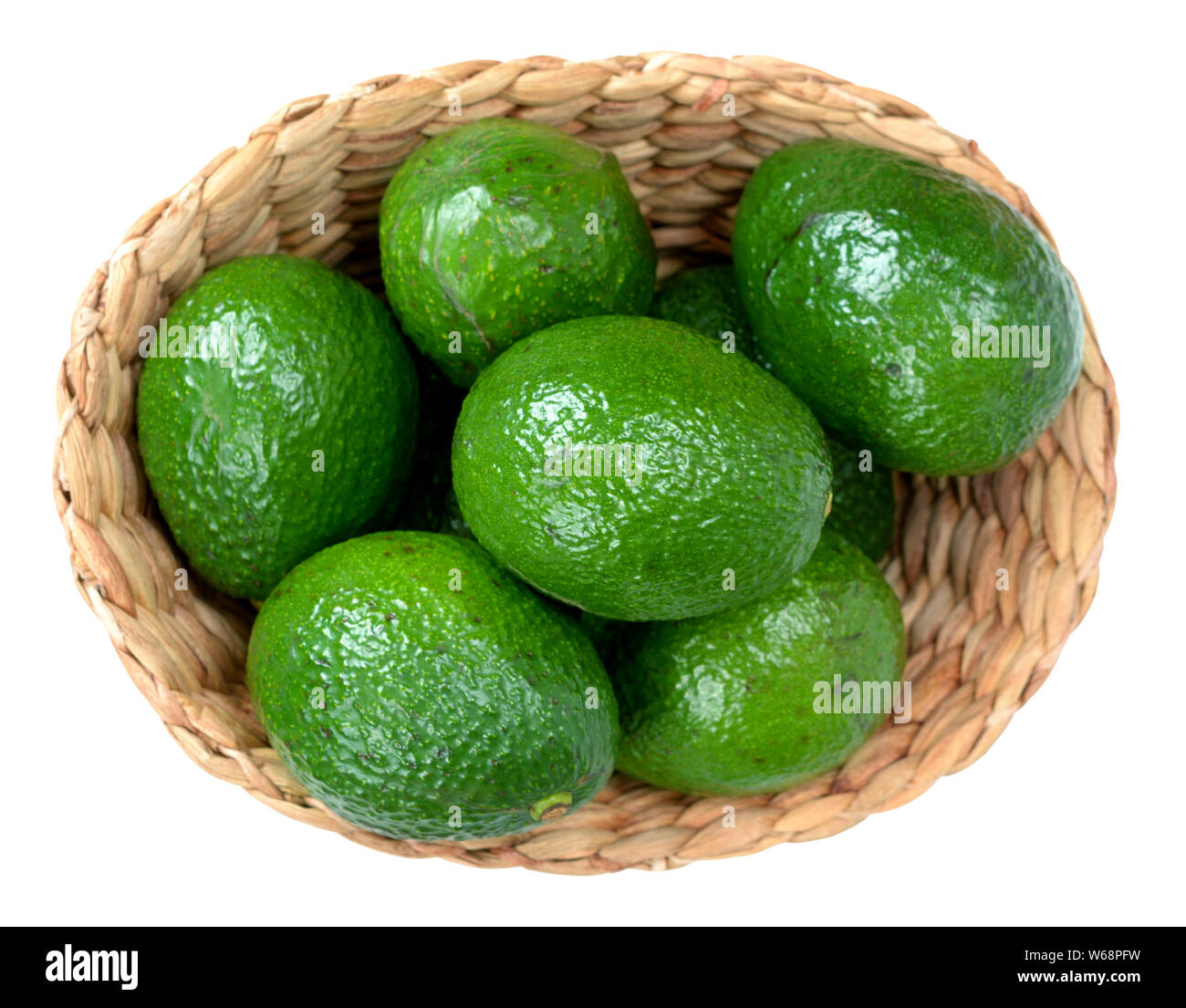 fresh green avocado in bamboo basket isolate on white background Stock ...