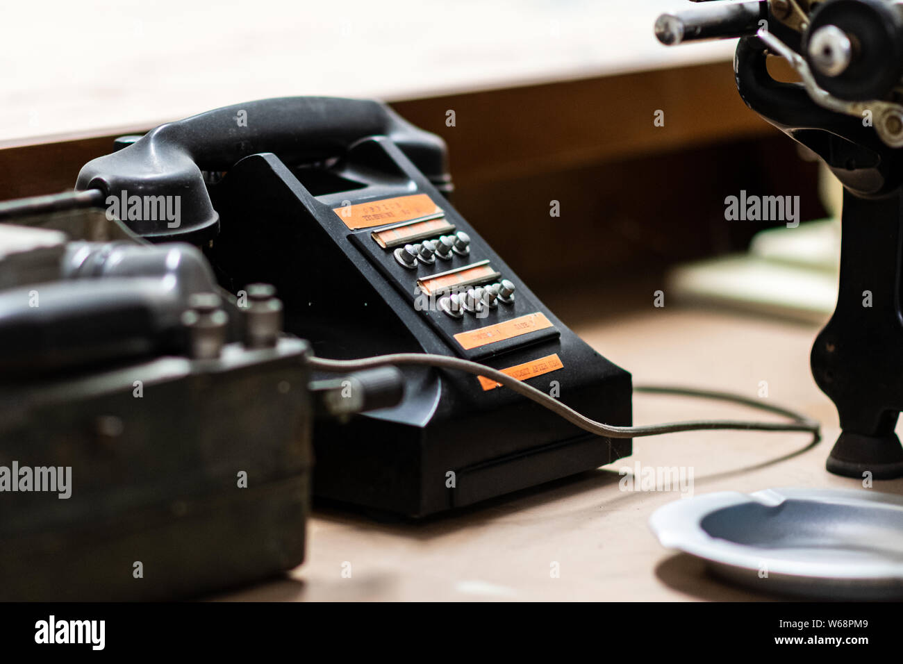 DONCASTER, UK - 28TH JULY 2019: An old vintage army telephone sits on a ...